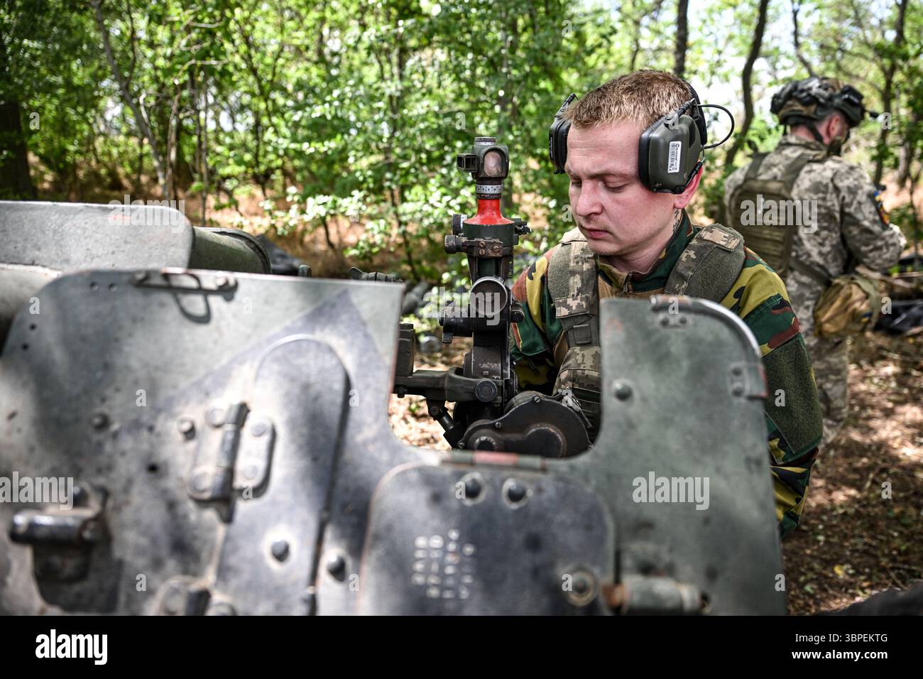 Ukrainian soldier with the call sign “Nik,” a gunner of the 110th ...