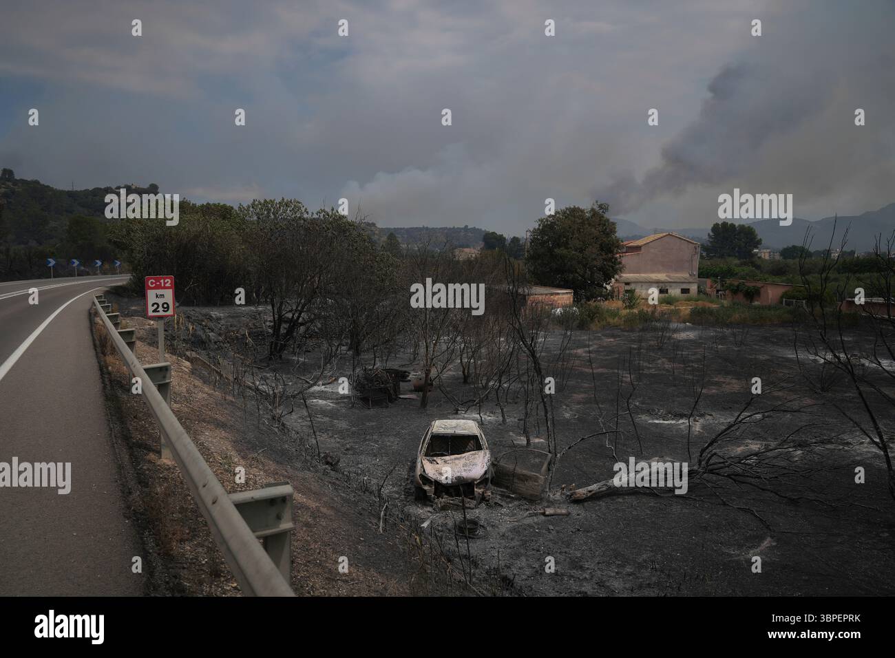 A vehicle burned by the Paüls fire on July 8, 2025, in Aldover ...