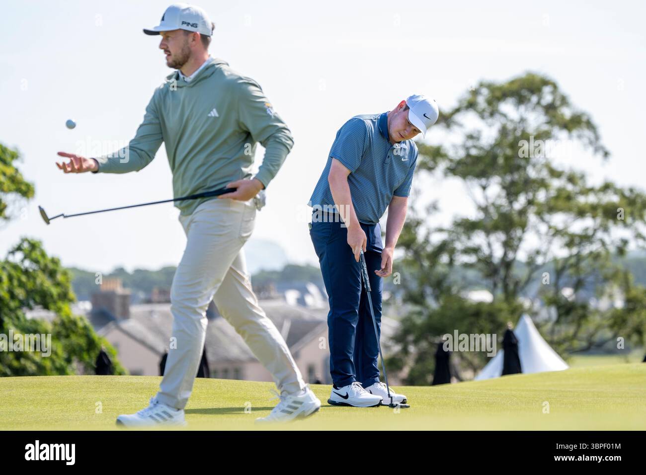 Scotland's Connor Syme (left) and Robert MacIntyre on the 17th green ...