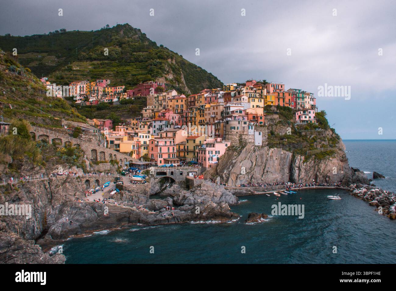 Manarola Clinging to the Cliff Before the Storm Stock Photo - Alamy