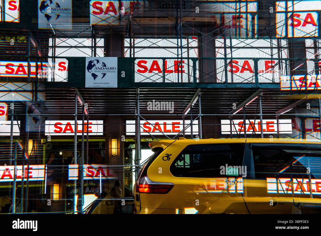 Sale signs in a JD Sports store in Times Square in New York on ...
