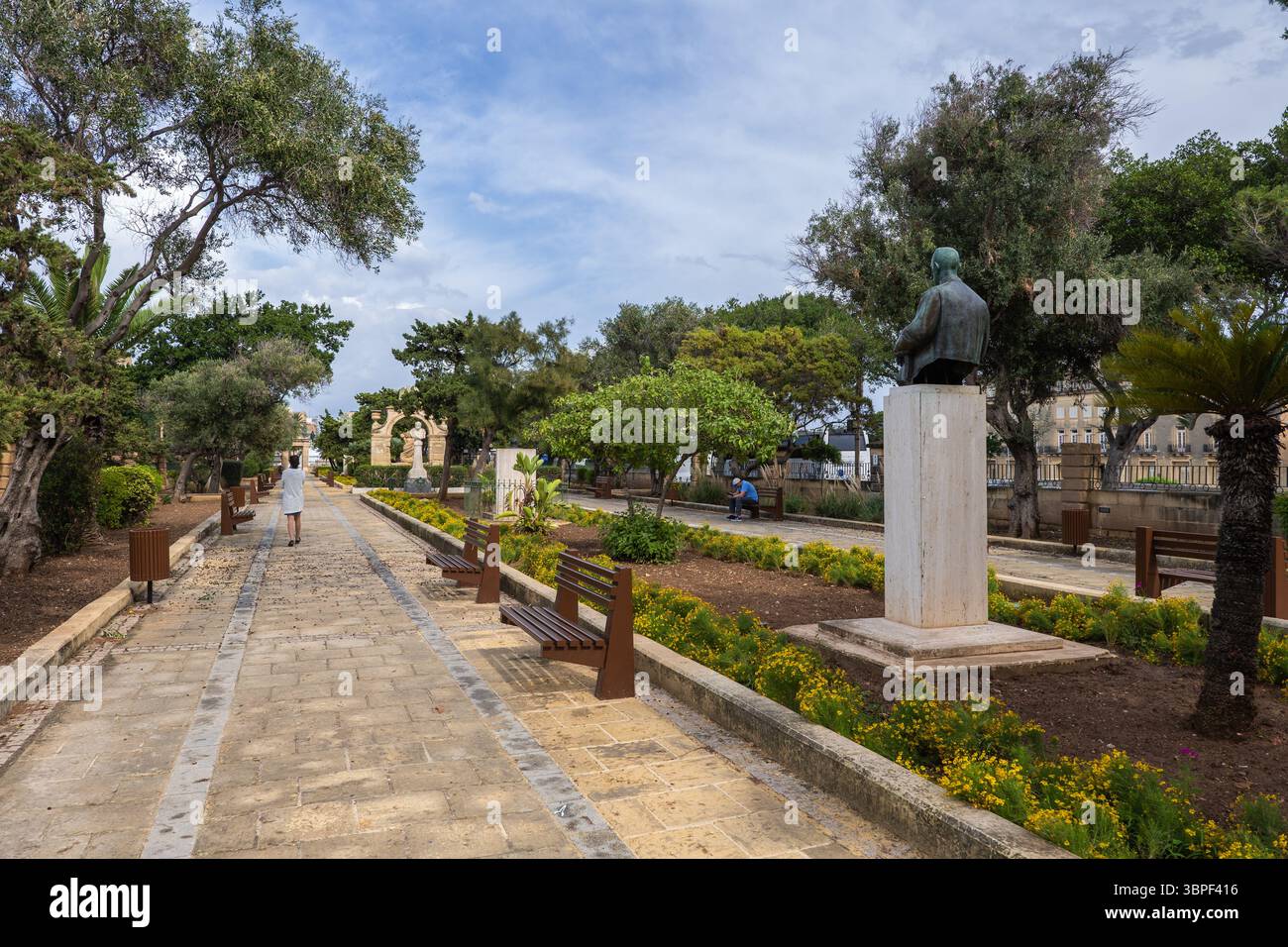 The Mall Il-Mall gardens with promenade and monuments in Floriana ...