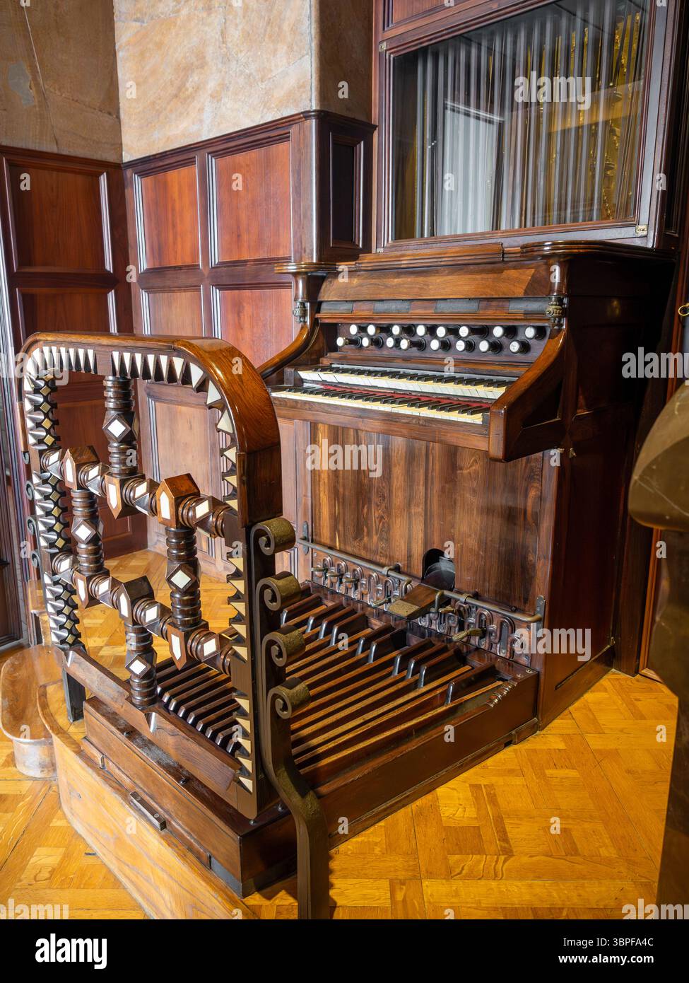 The console and pedals of the grand pipe organ, an integral part of the ...