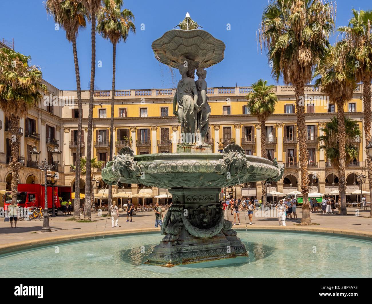 The famous Font de les Tres Gràcies fountain surrounded by the arcaded ...