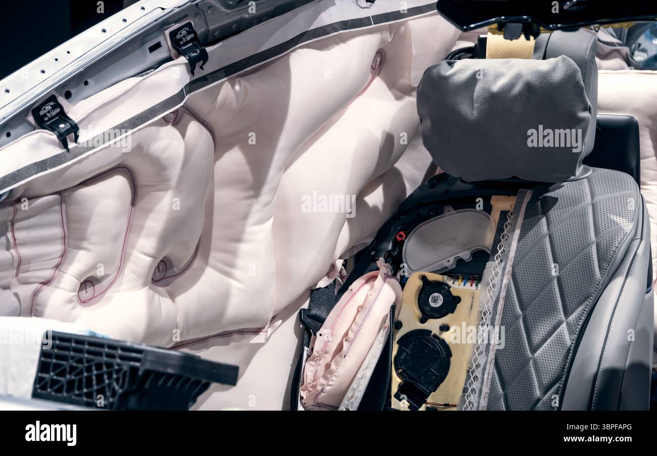 Airbags deployed in a modern Mercedes-Benz car in a safety ...