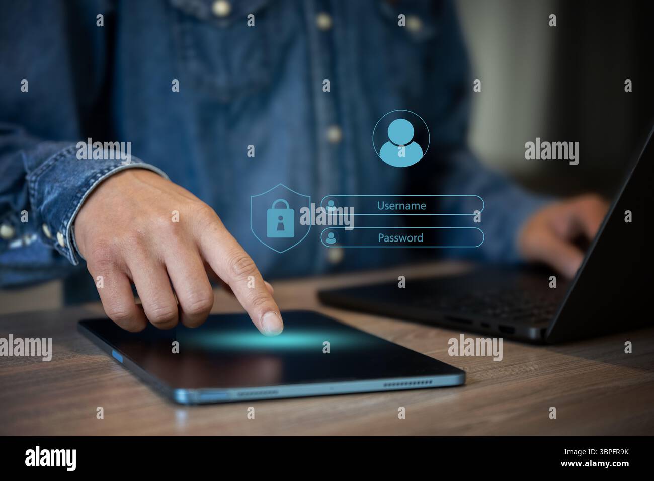 Business man work with laptop use electronic pen to key username and ...