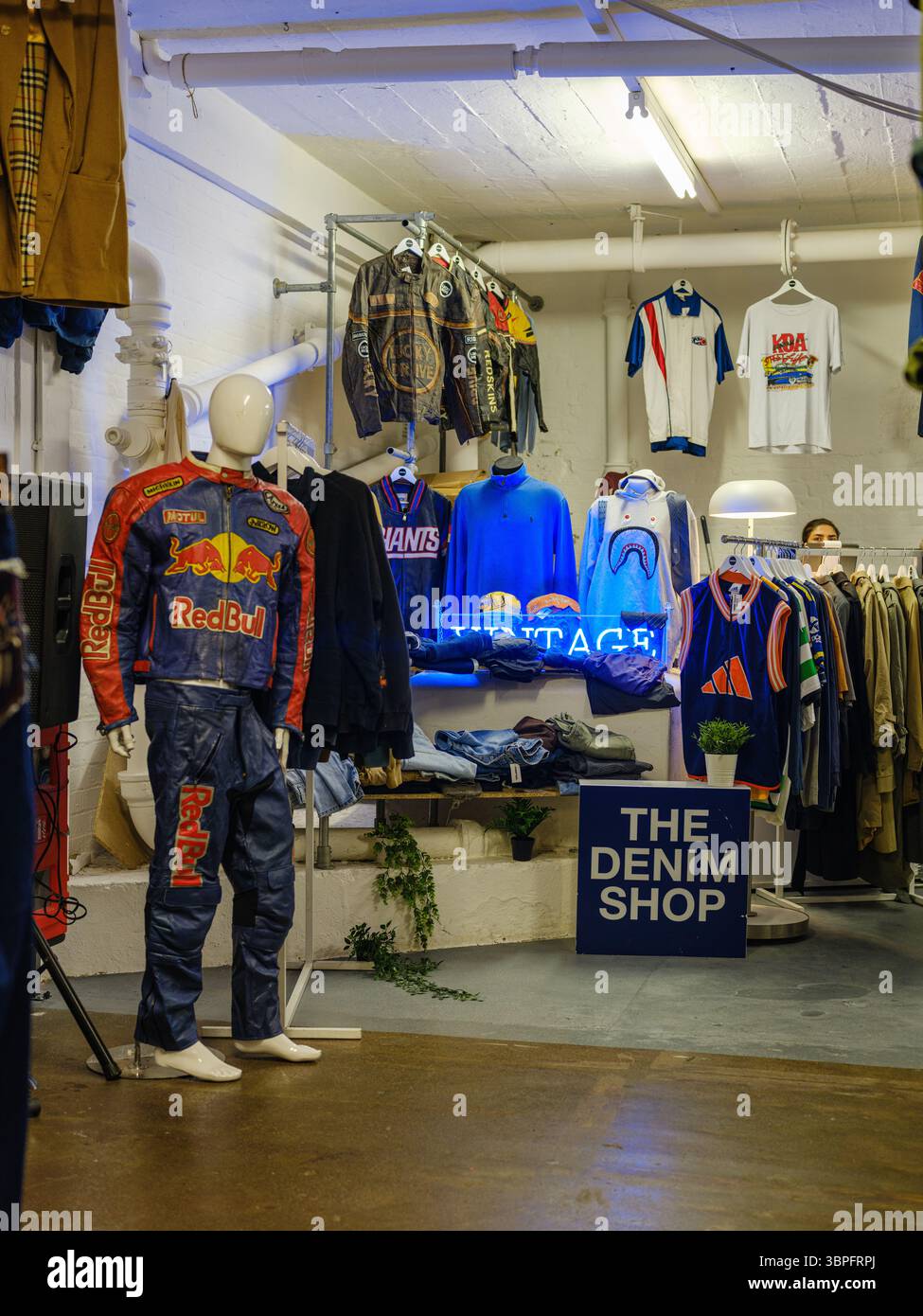 United Kingdom, London, 13 Jul 2025. Interior of a retro clothing store ...