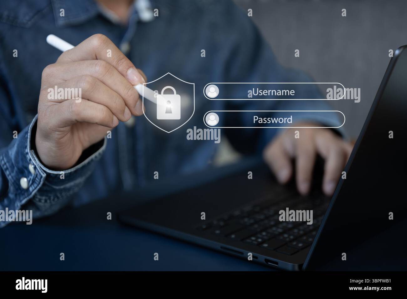 Business man work with laptop use electronic pen to key username and ...