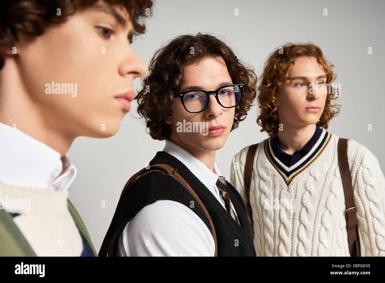 Three young men with distinct styles pose together, exuding friendship ...