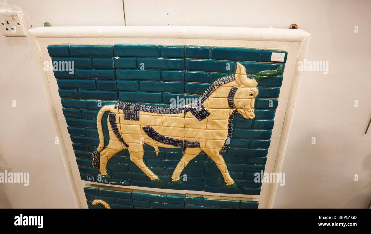 Intricate wall panel displays a mythical creature crafted from tiles ...