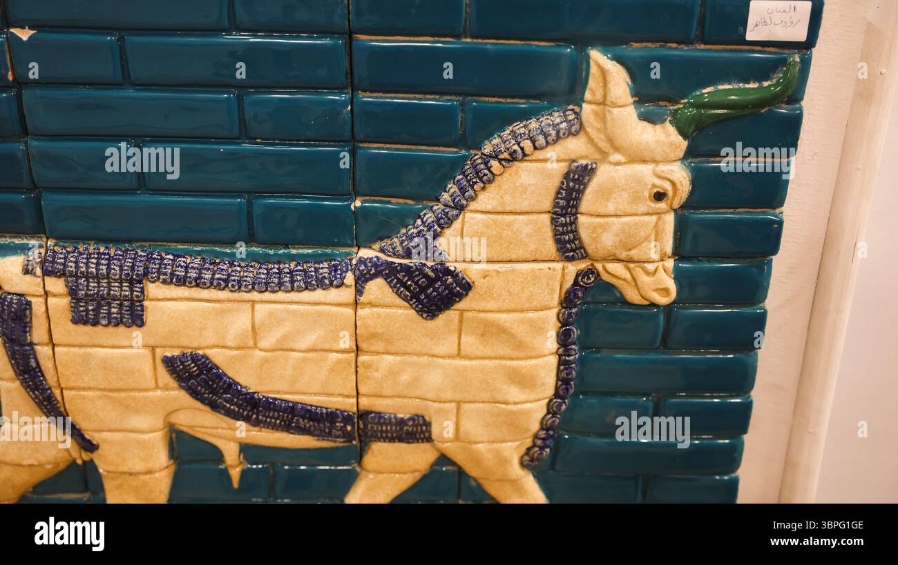 A detailed tiled relief of a bull displayed at Hilla Museum in Iraq ...