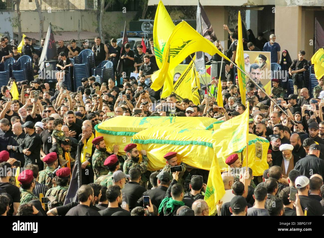 Shots from the funeral ceremony of Hezbollah fighters (mujahid) Hajj ...
