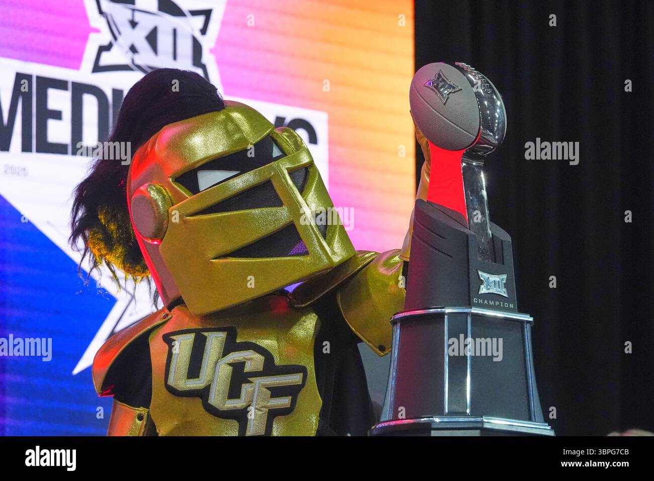 The UCF mascot touched the conference champion trophy during Big 12 ...