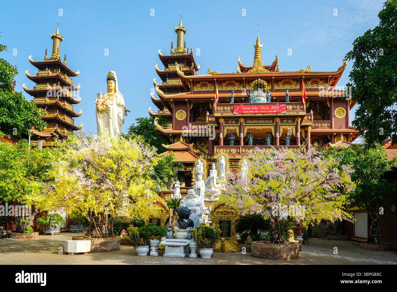 Mui Ne, Vietnam-March 22,2025: Grand Buddhist temple with ornate golden ...