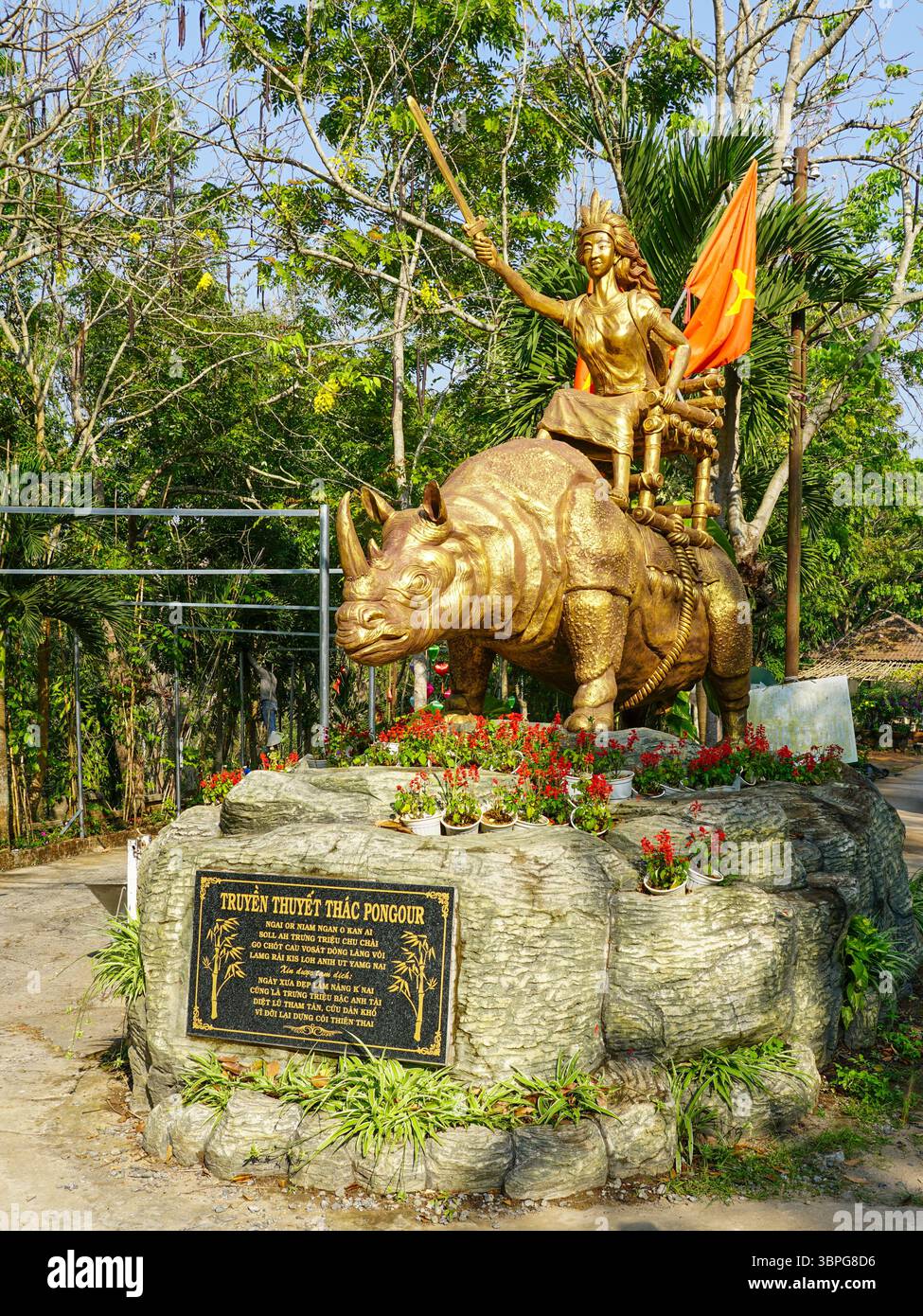 Dalat, Vietnam- March 24, 2025: Golden monument at Pongour Waterfall ...