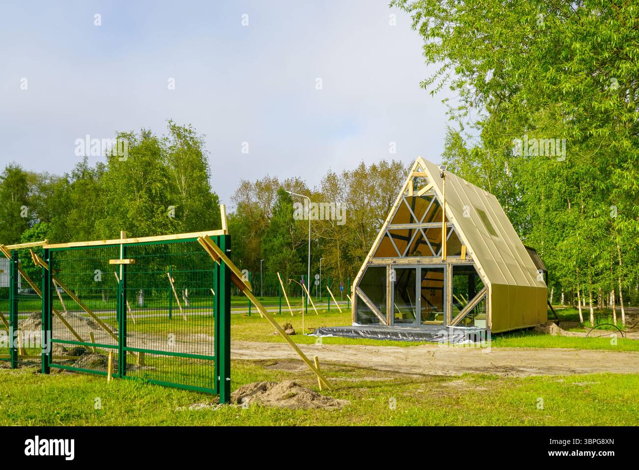 New A-Frame Glamping Cabin Under Construction in a Forested Campground ...