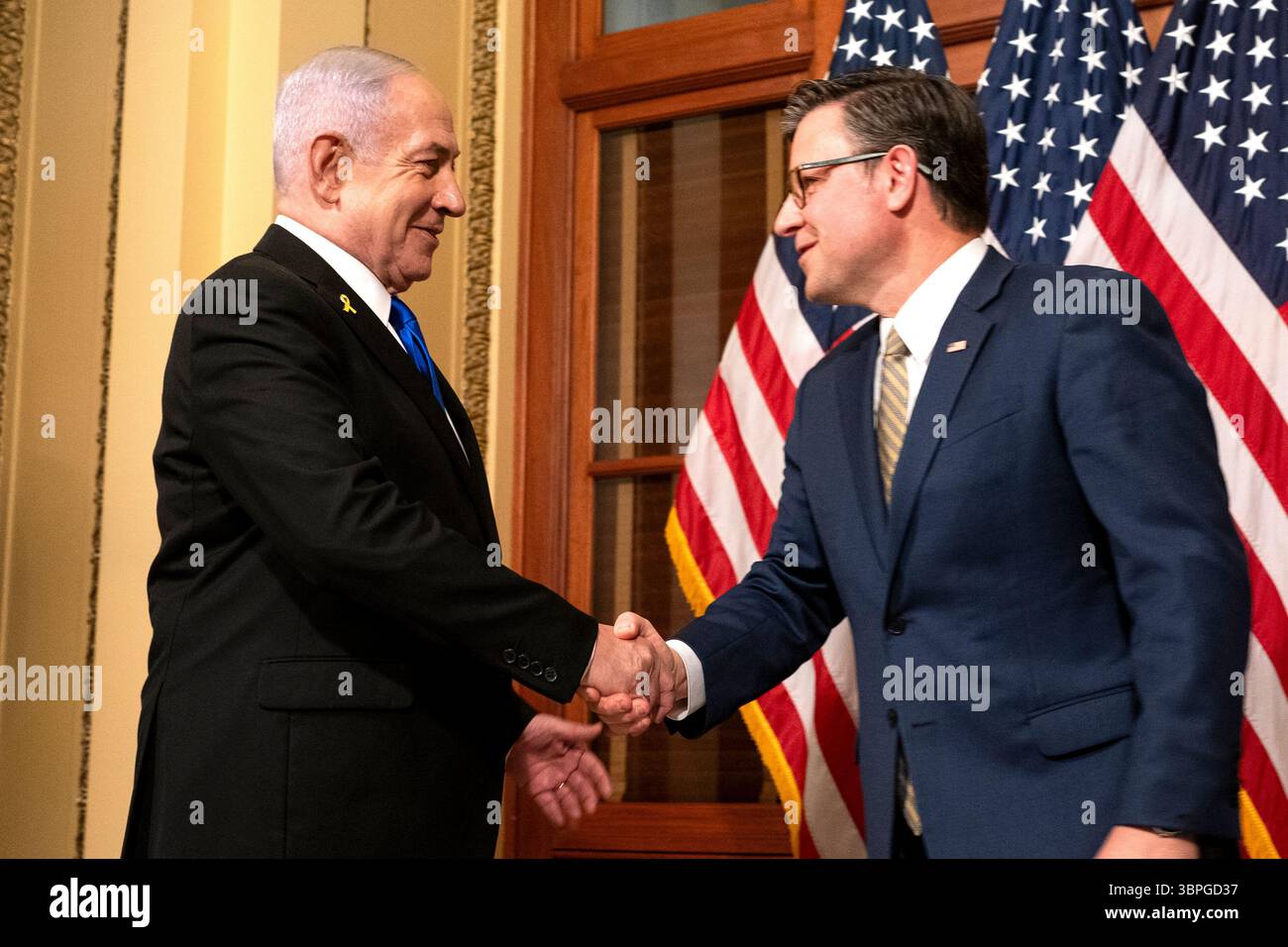 Israeli Prime Minister Benjamin Netanyahu shakes hands with Speaker ...