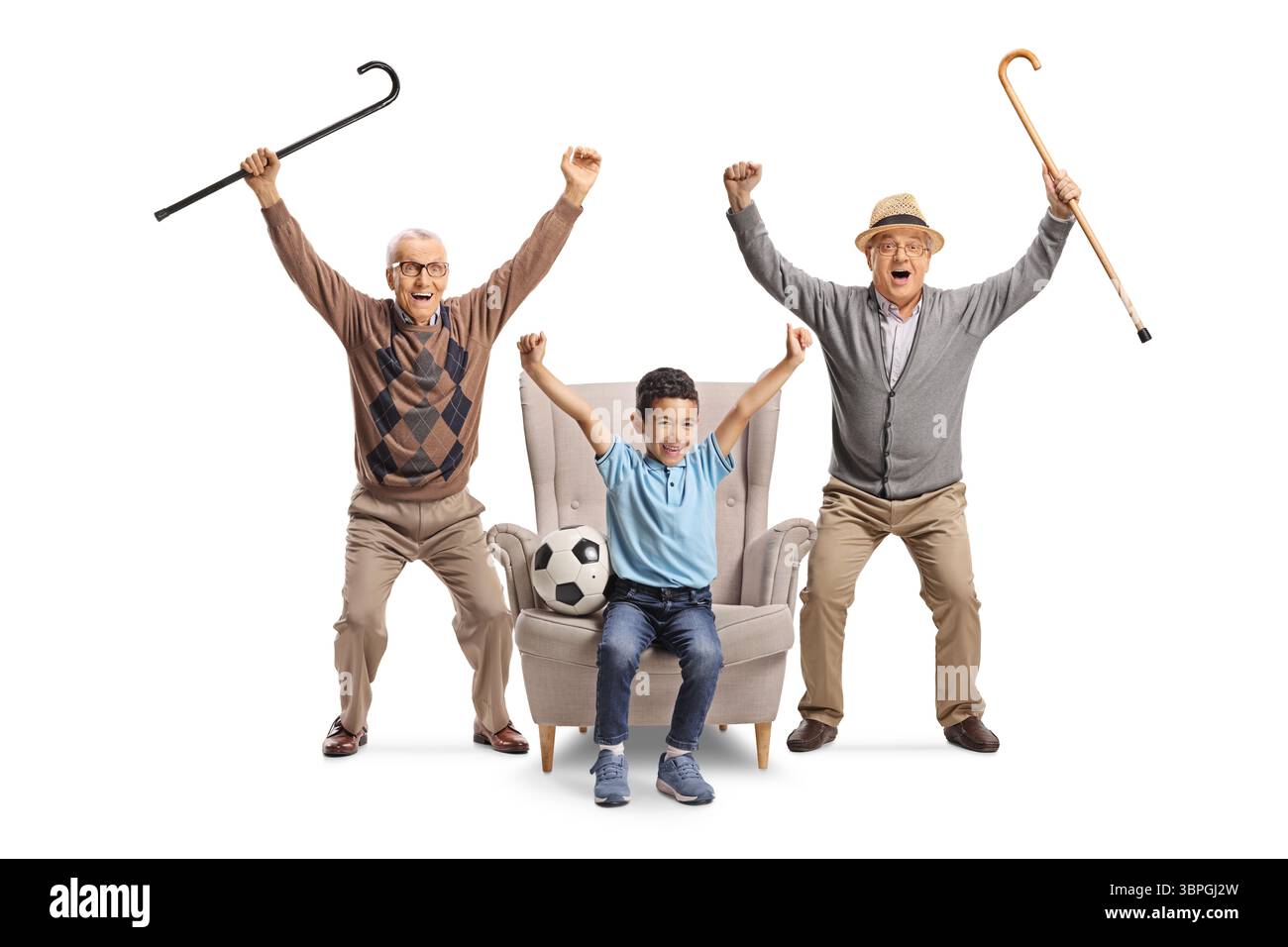 Boy sitting in an armchair and cheering with elderly men football fans ...