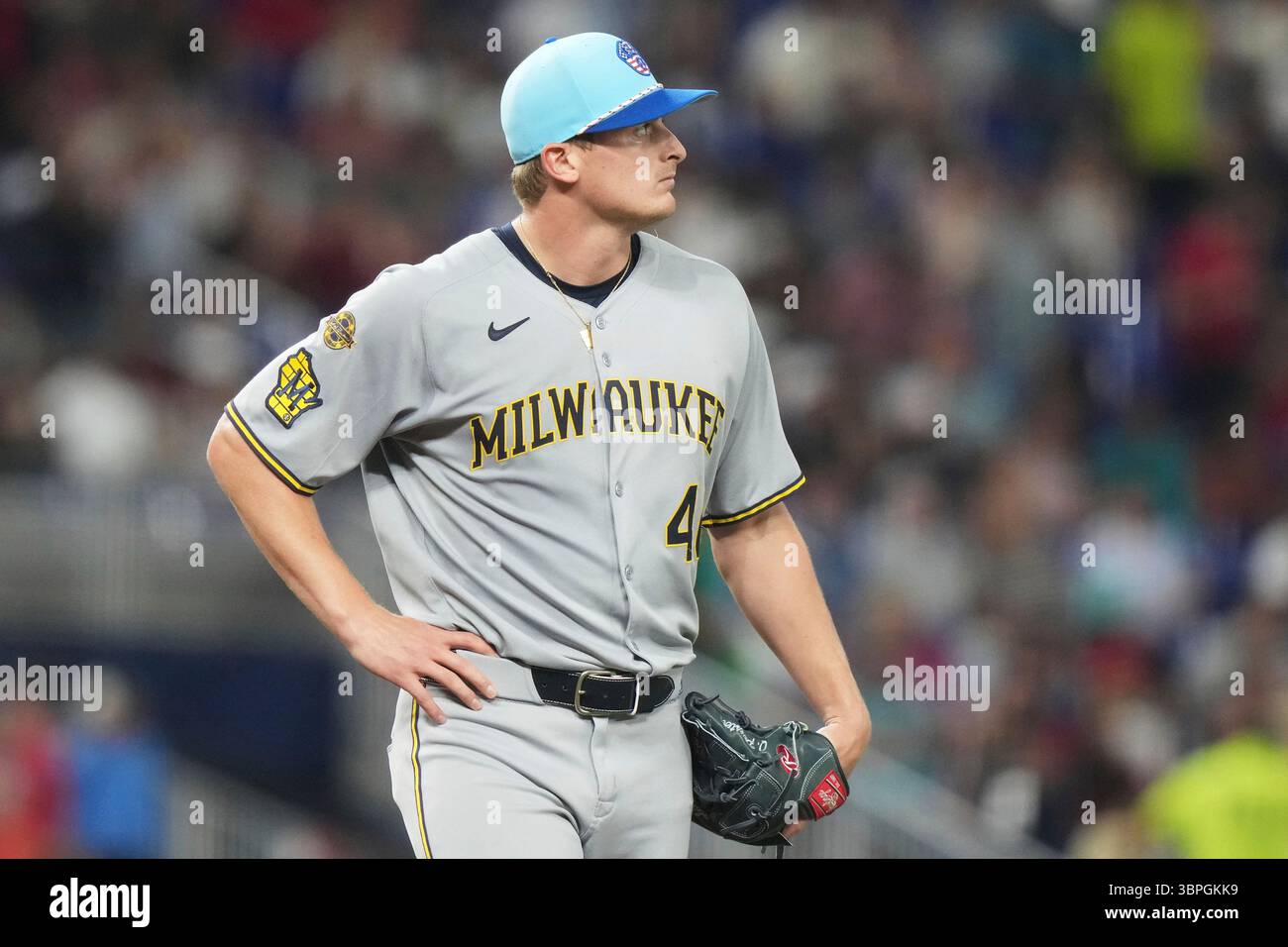 Milwaukee Brewers starting pitcher Quinn Priester stands on the mound ...