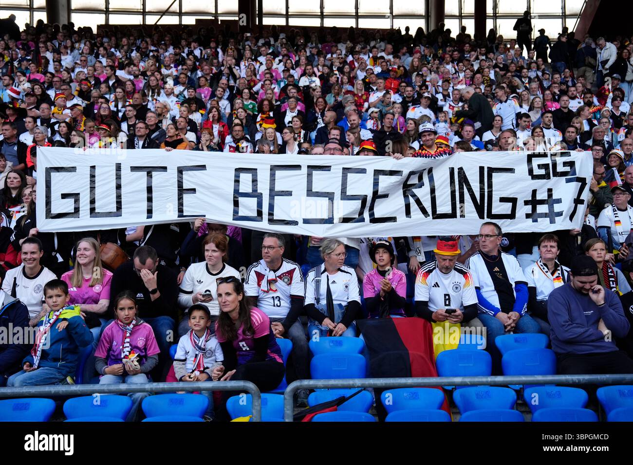 Germany fans hold up a banner for Giulia Gwinn, who has been ruled out ...