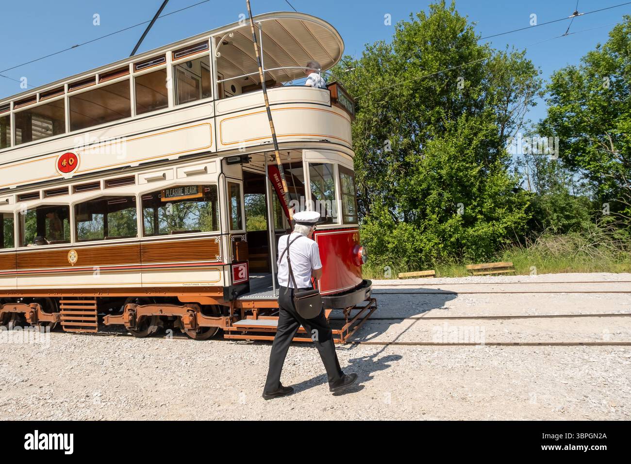 Crich, Derbyshire, UK – June 19 2025. A tram driver manually switching the points for the return ...