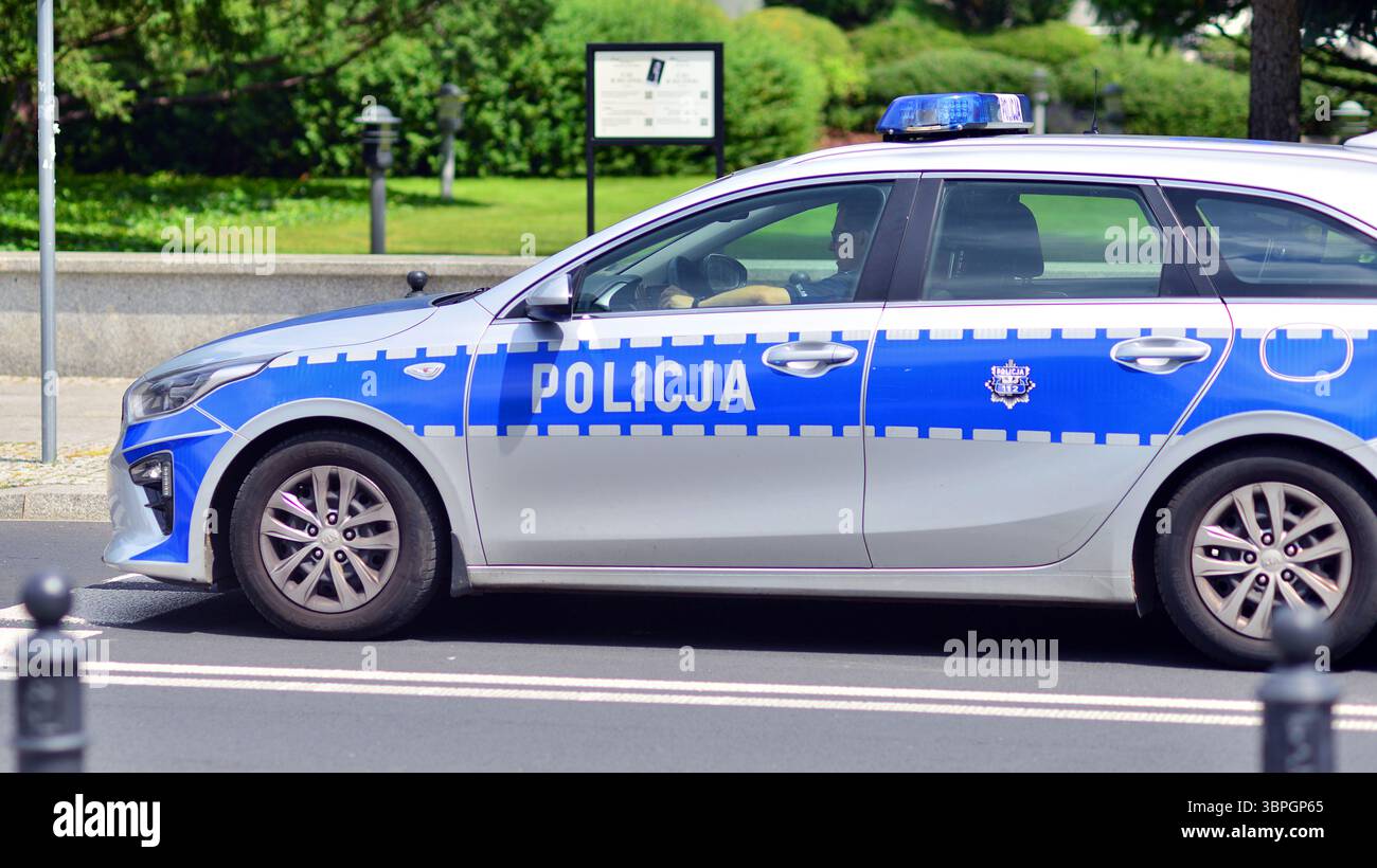 Warsaw, Poland. 8 July 2025. Polish police car on the street. View of a ...