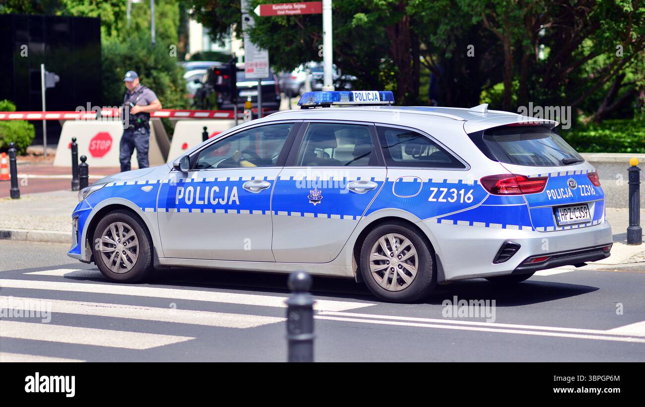 Warsaw, Poland. 8 July 2025. Polish police car on the street. View of a ...