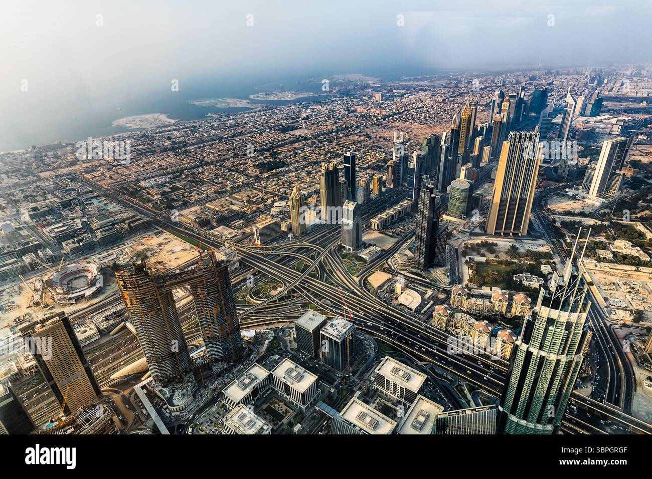 View of a sprawling cityscape with towering skyscrapers kissed by the ...