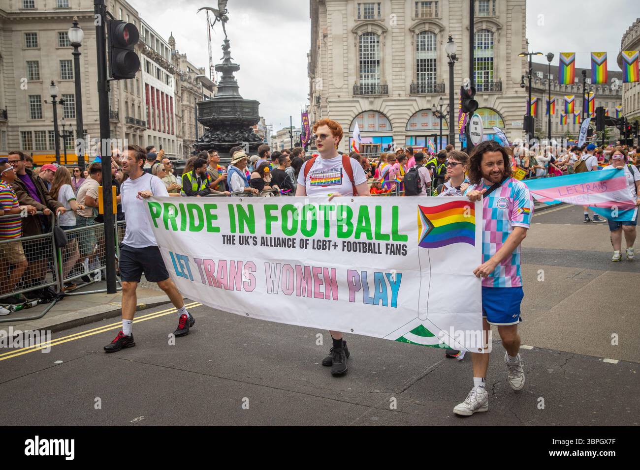 Pride in football banner with trans supportive slogan at Pride in ...