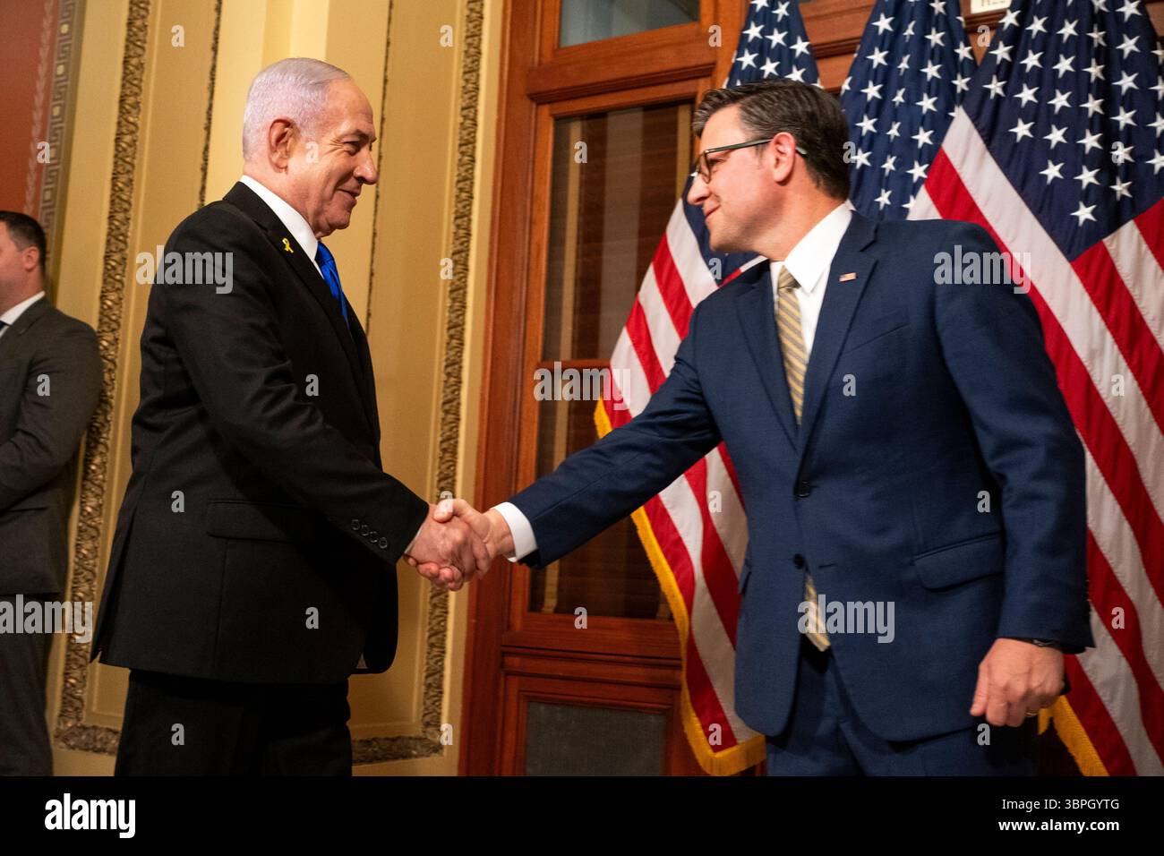 Israeli Prime Minister Benjamin Netanyahu shakes hands with Speaker ...