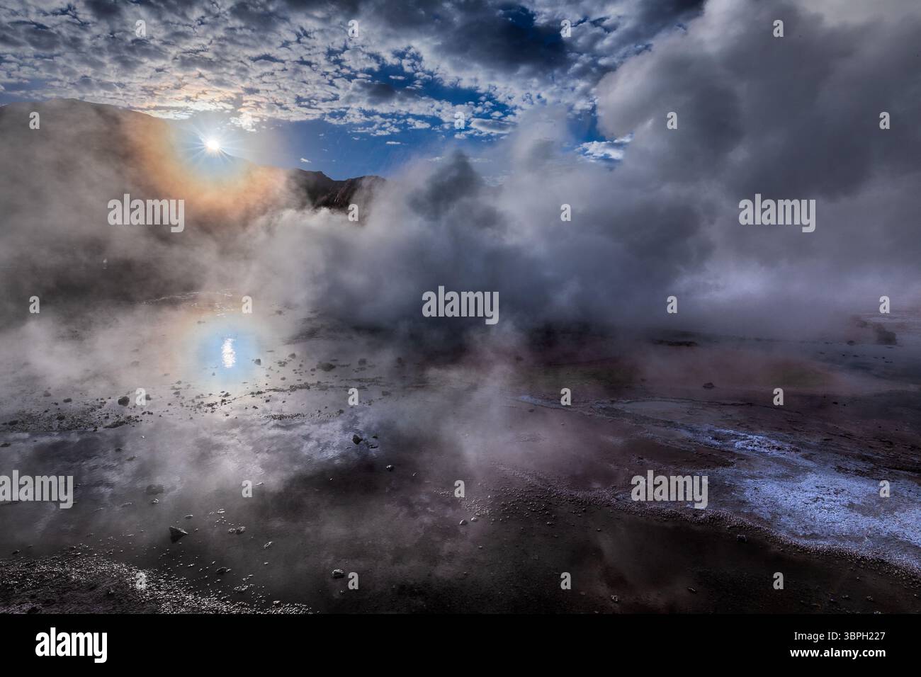 View of geothermal steam rises from the ground, creating an ethereal ...