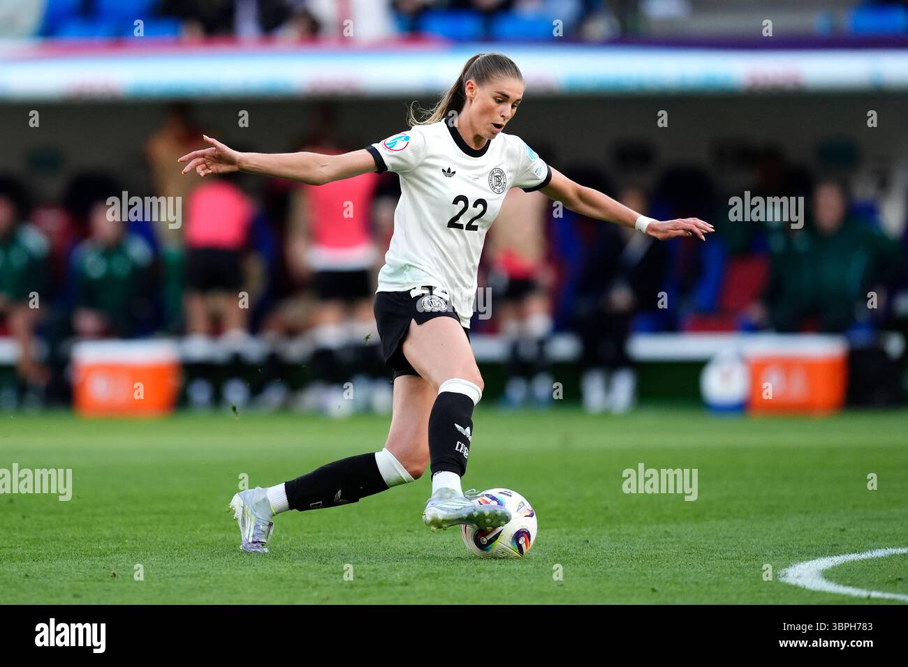 Germany's Jule Brand claims the ball after it hit Denmark's Emma Snerle ...