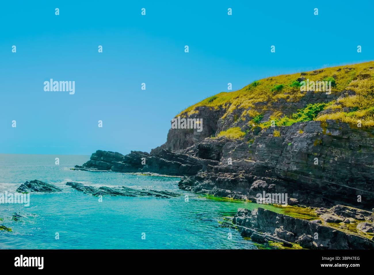 Coastal cliffs sparkling blue water hi-res stock photography and images ...