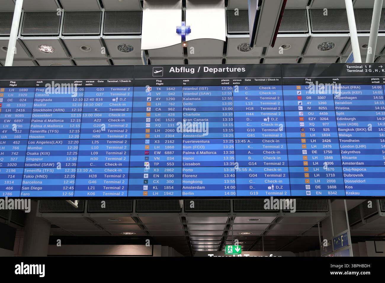 03.07.2025 Germany, Munich: Modern Airport Departure Board Displaying ...