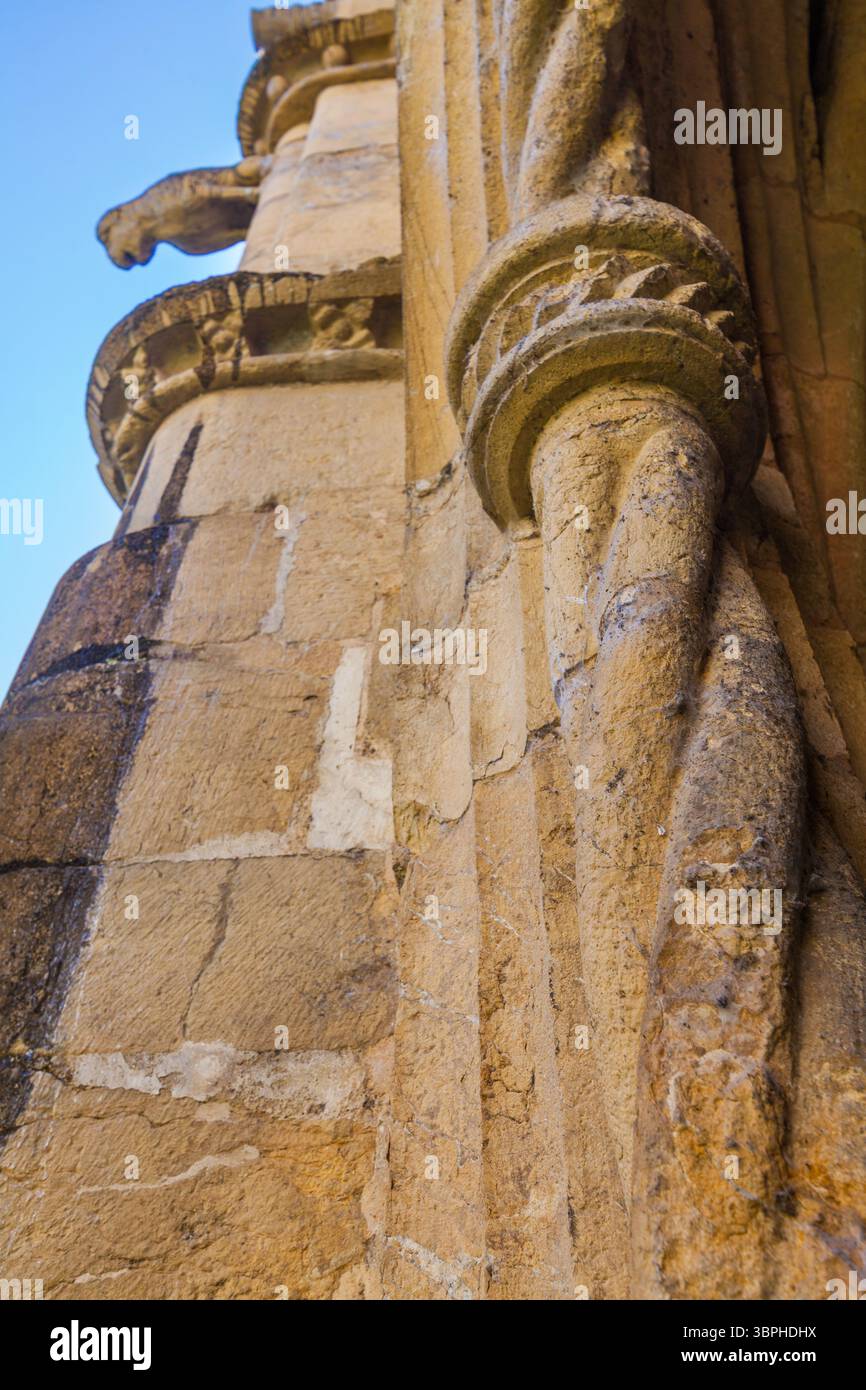detailed close-up of an ancient stone column with intricate spiral ...
