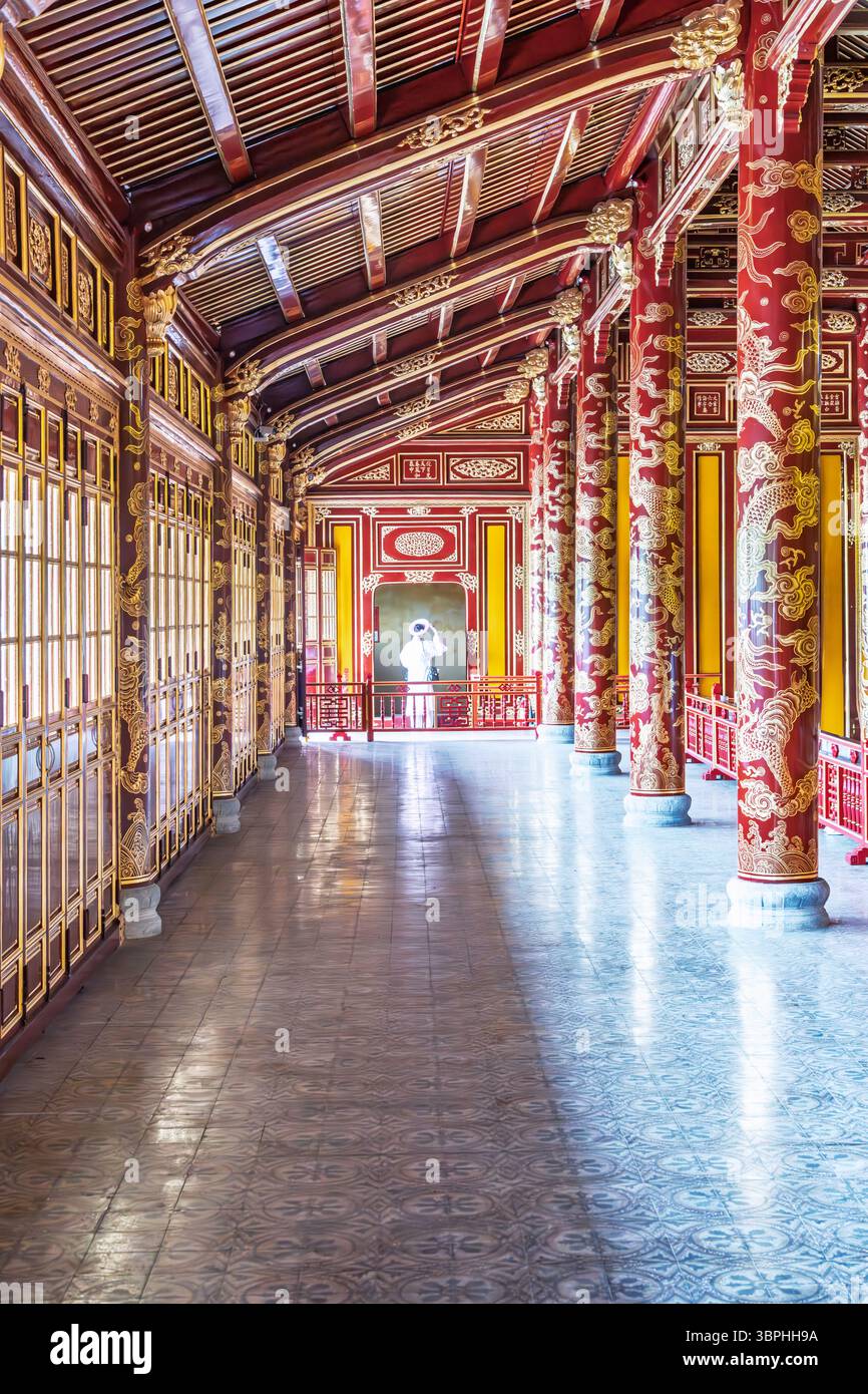 Interior view of a traditional Vietnamese palace corridor with ornate ...