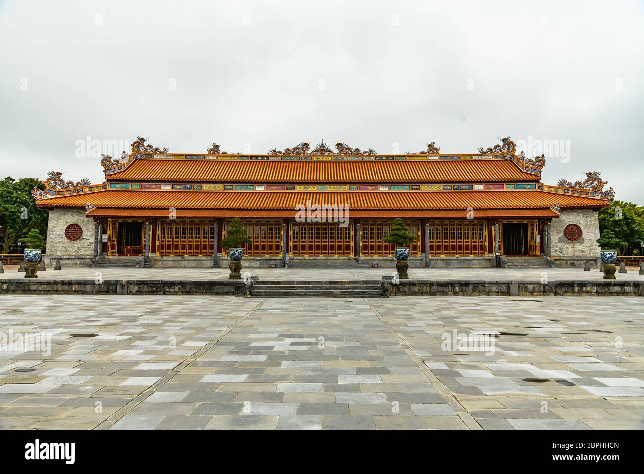 Front view of a traditional Vietnamese palace building with ornate roof ...