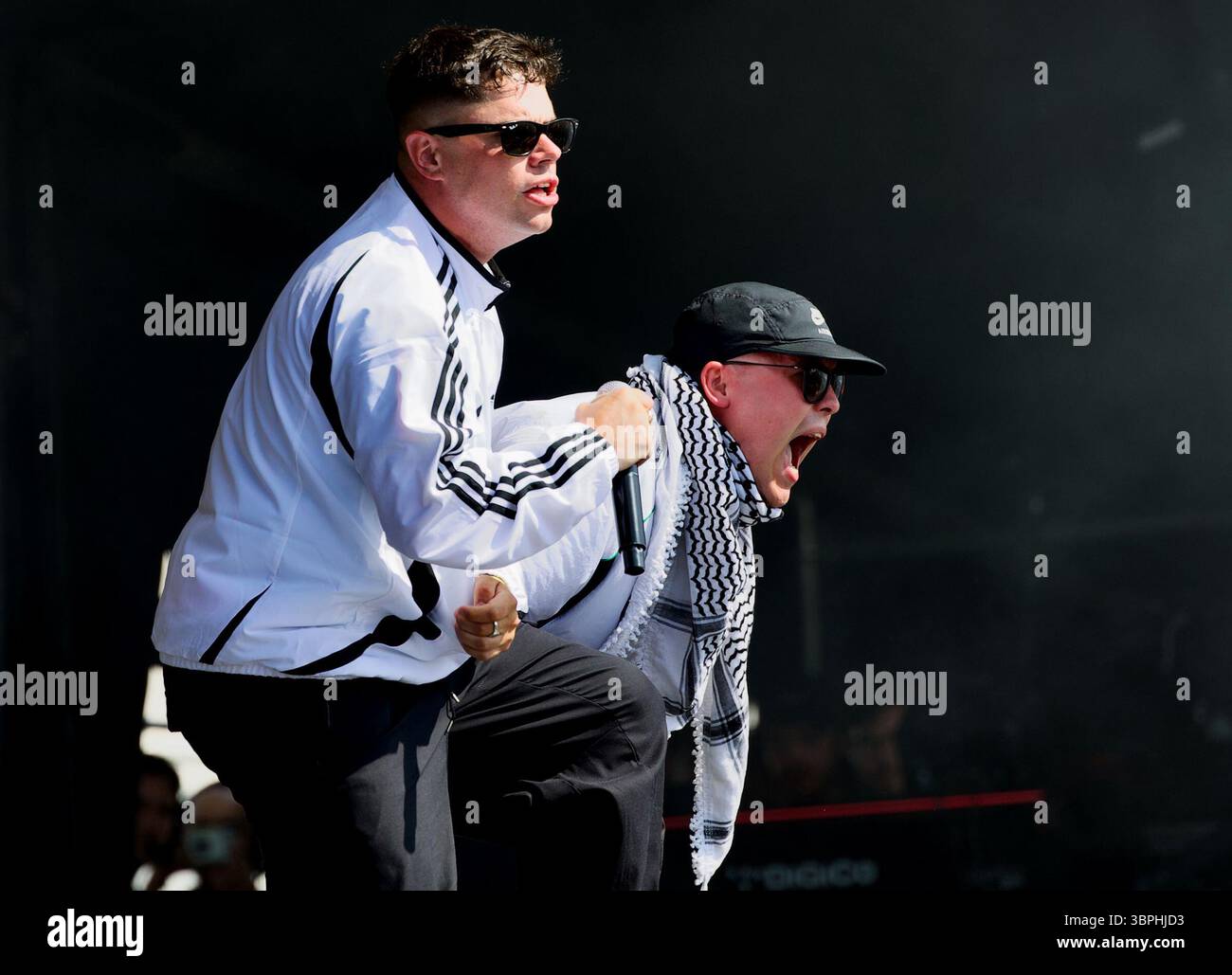 kneecap Performing at the 2025 Glastonbury Festival photo by David ...