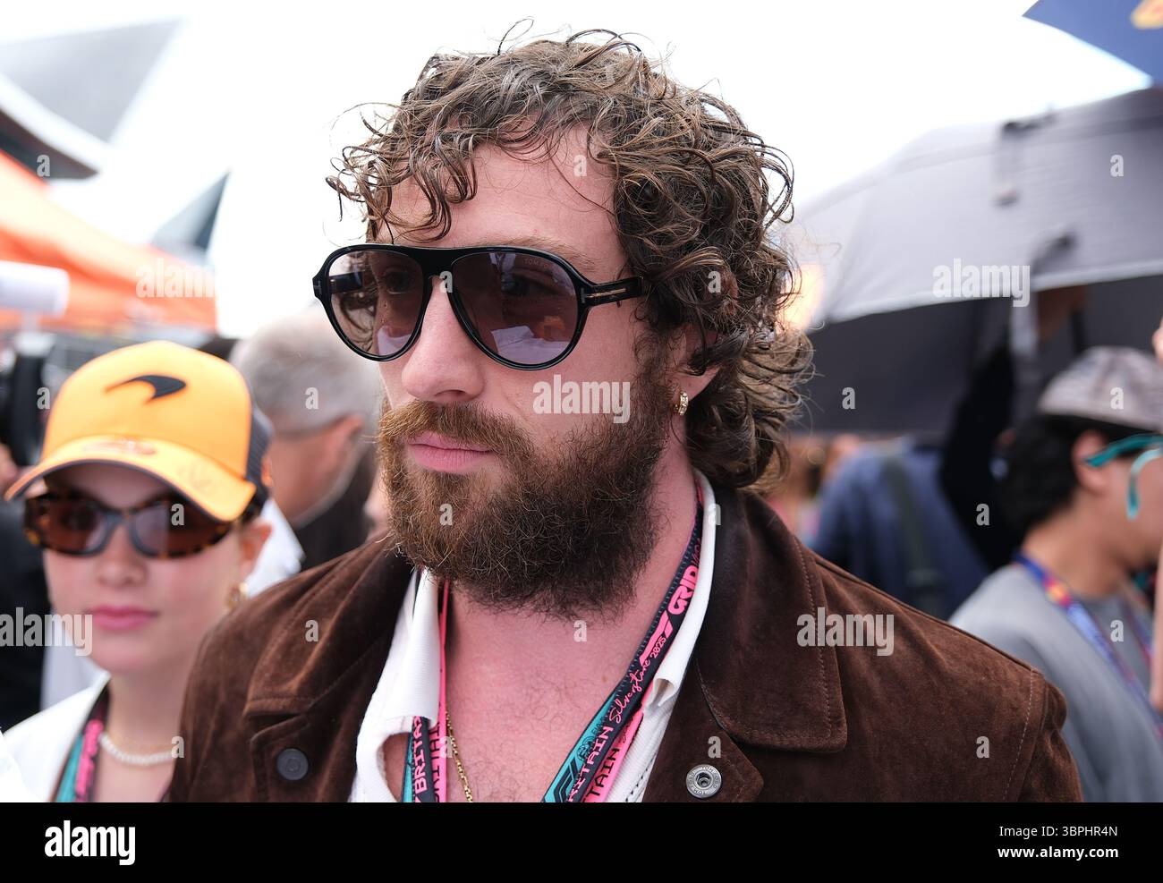 Actor Aaron Taylor Johnson is seen on the grid during the Formula One ...