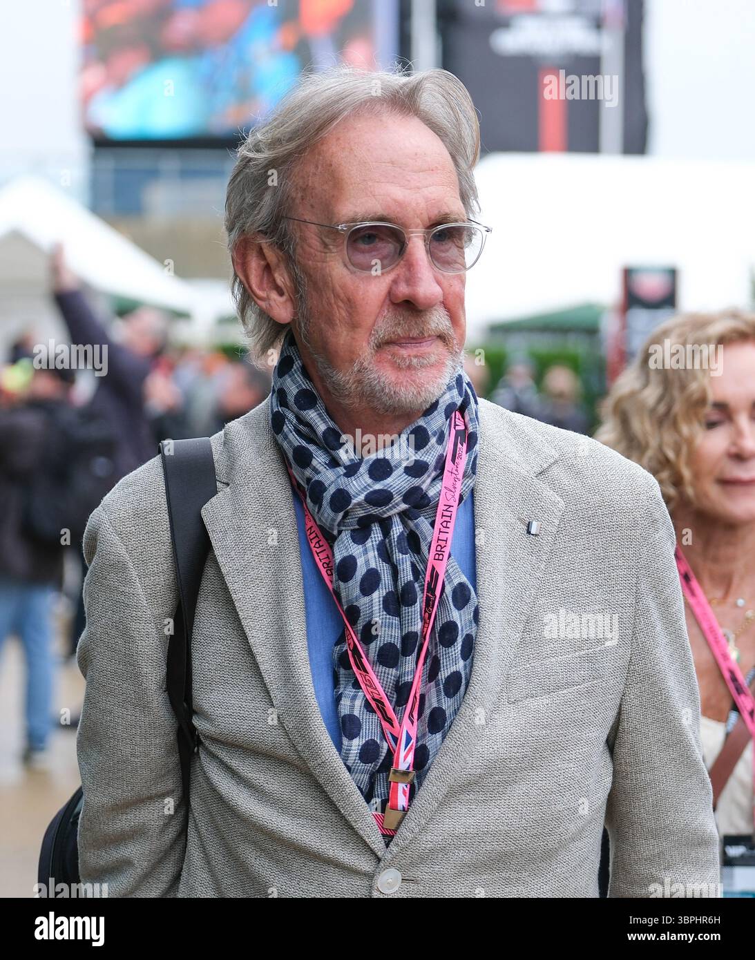 Musician Mike Rutherford is seen in the paddock during the Formula One ...