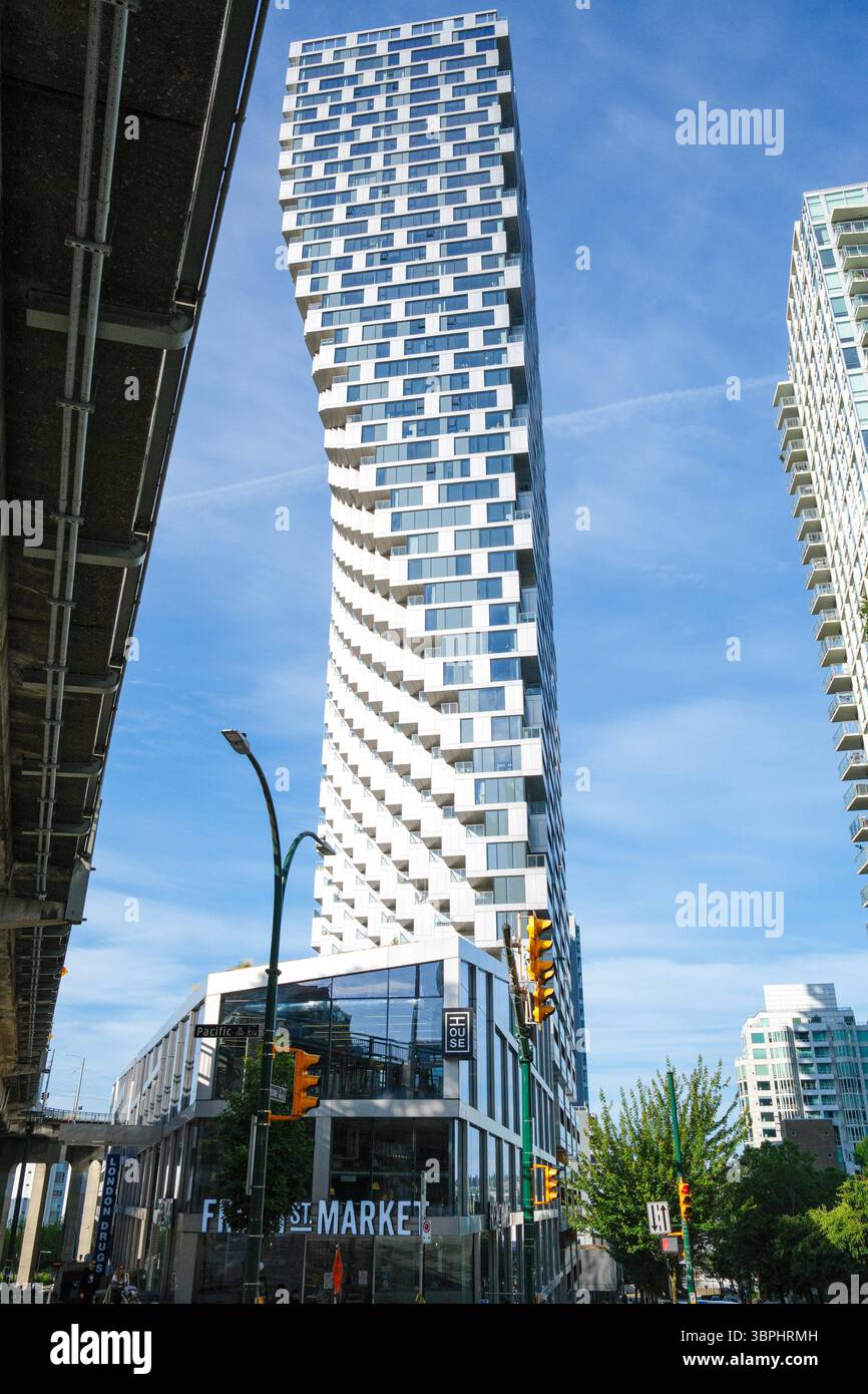 The modern architectural design of Vancouver House alongside the ...