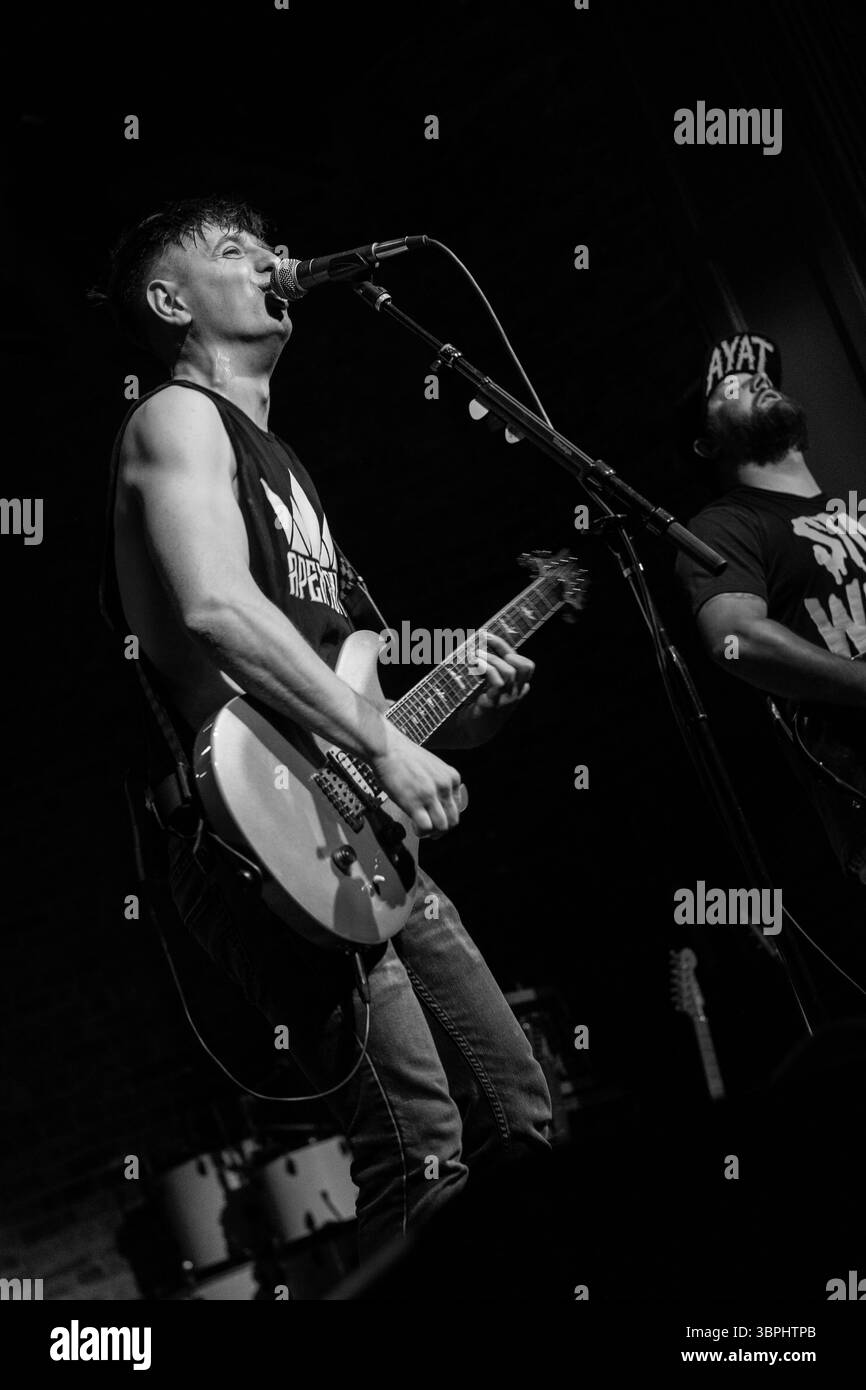 Pop punk bass player Black and White Stock Photos & Images - Alamy