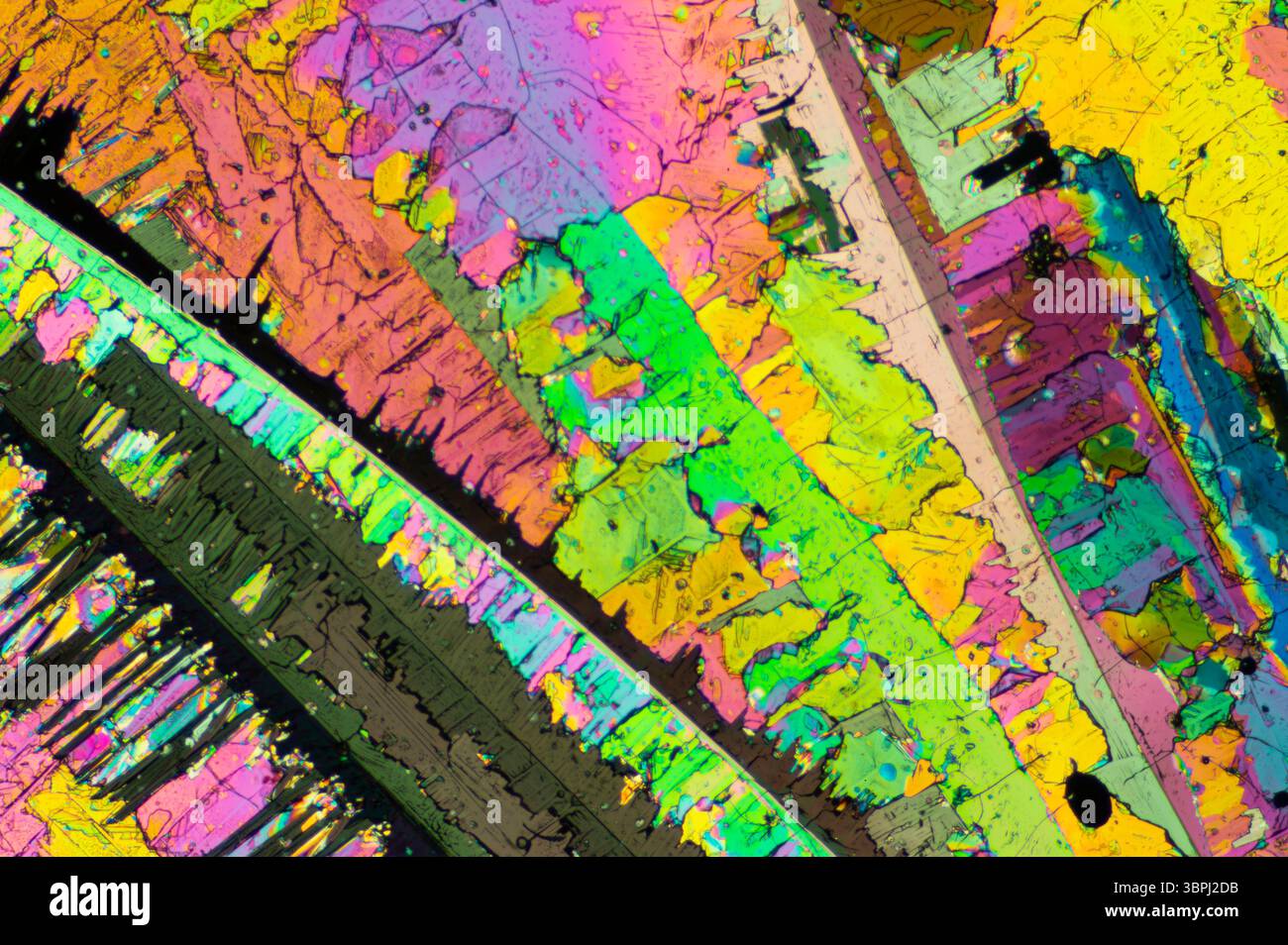 Sulphur crystallisation, polarised light micrograph. Sulphur is a non ...