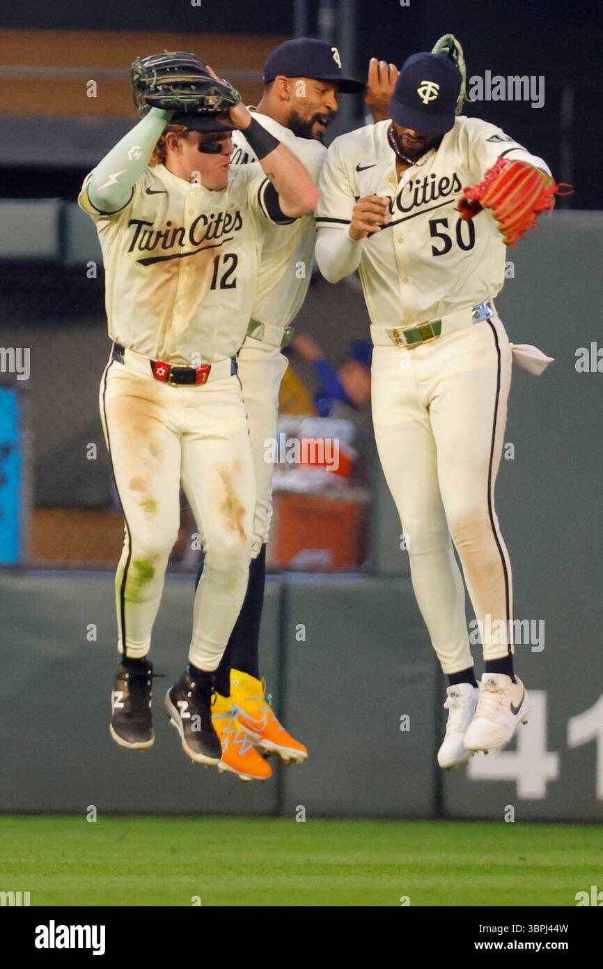 From left, Minnesota Twins left fielder Harrison Bader, center fielder ...