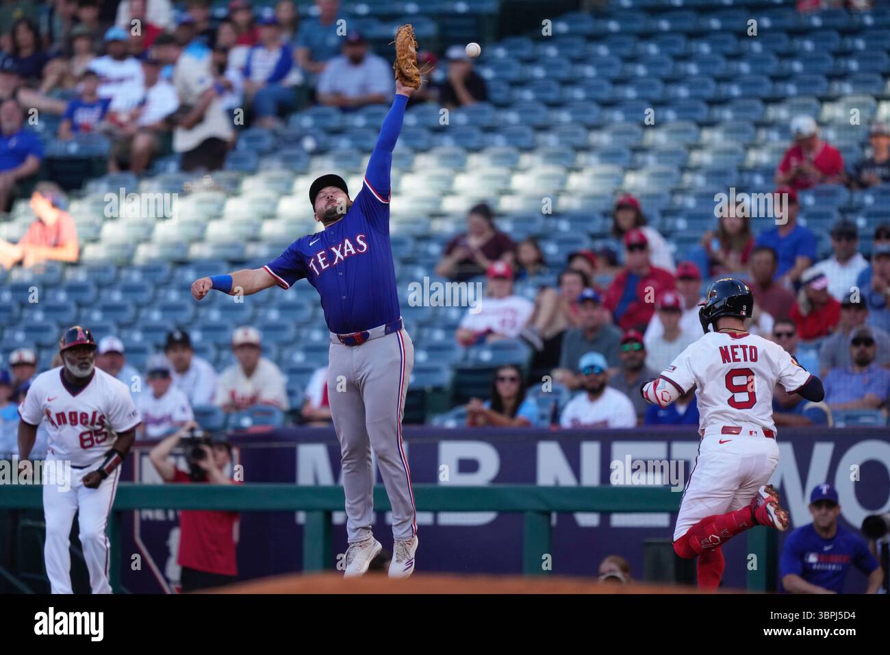 Los Angeles Angels' Zach Neto is safe at first as Texas Rangers first ...