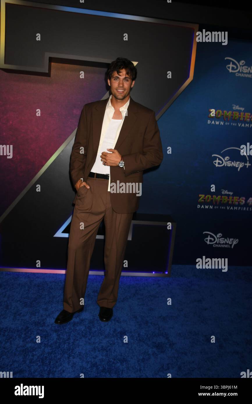 Drake Rodgerattends the world premiere of Disney's "Zombies 4: Dawn of ...