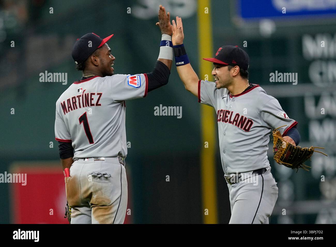 Cleveland Guardians' Angel Martínez (1) and Steven Kwan celebrate after ...