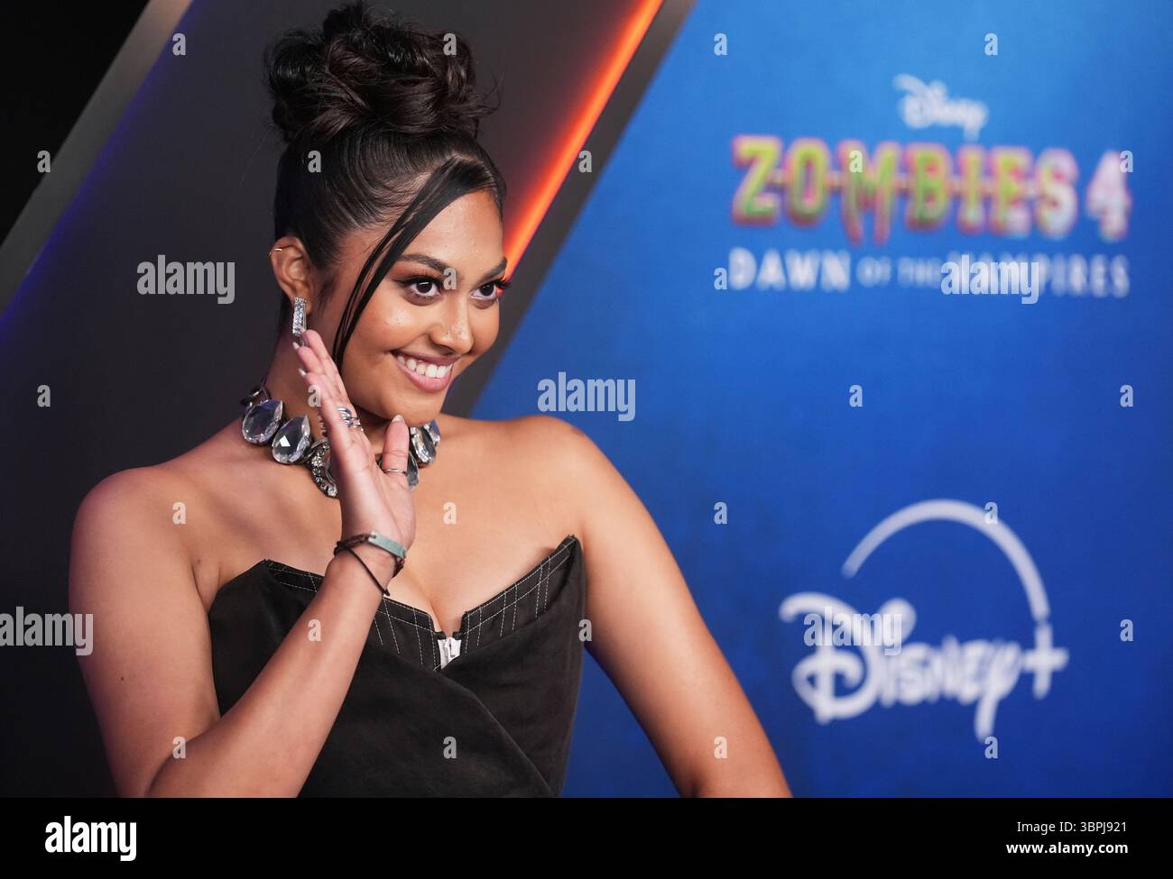 Swayam Bhatia poses at the premiere of "Zombies 4: Dawn of the Vampires ...