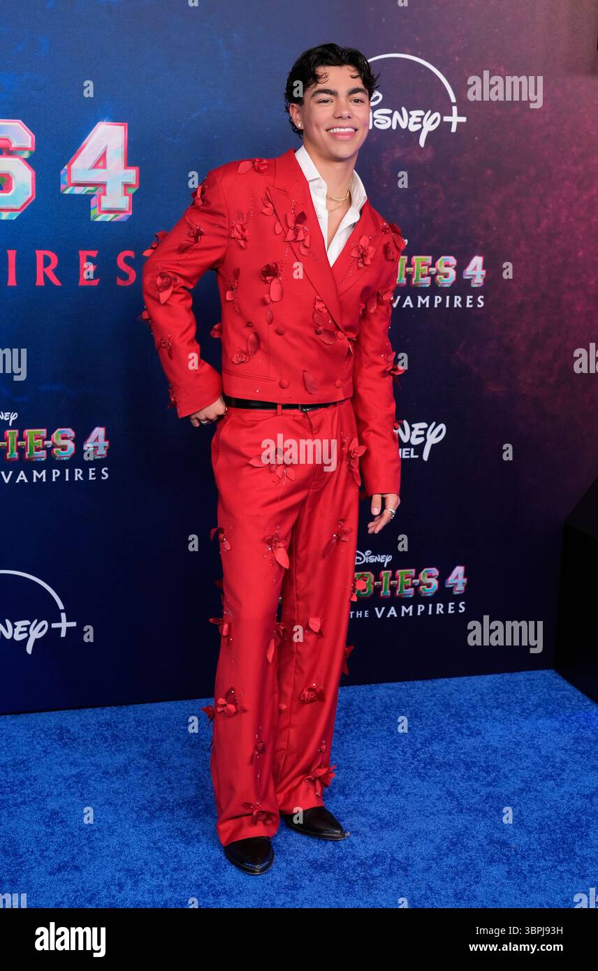 Malachi Barton poses at the premiere of "Zombies 4: Dawn of the ...