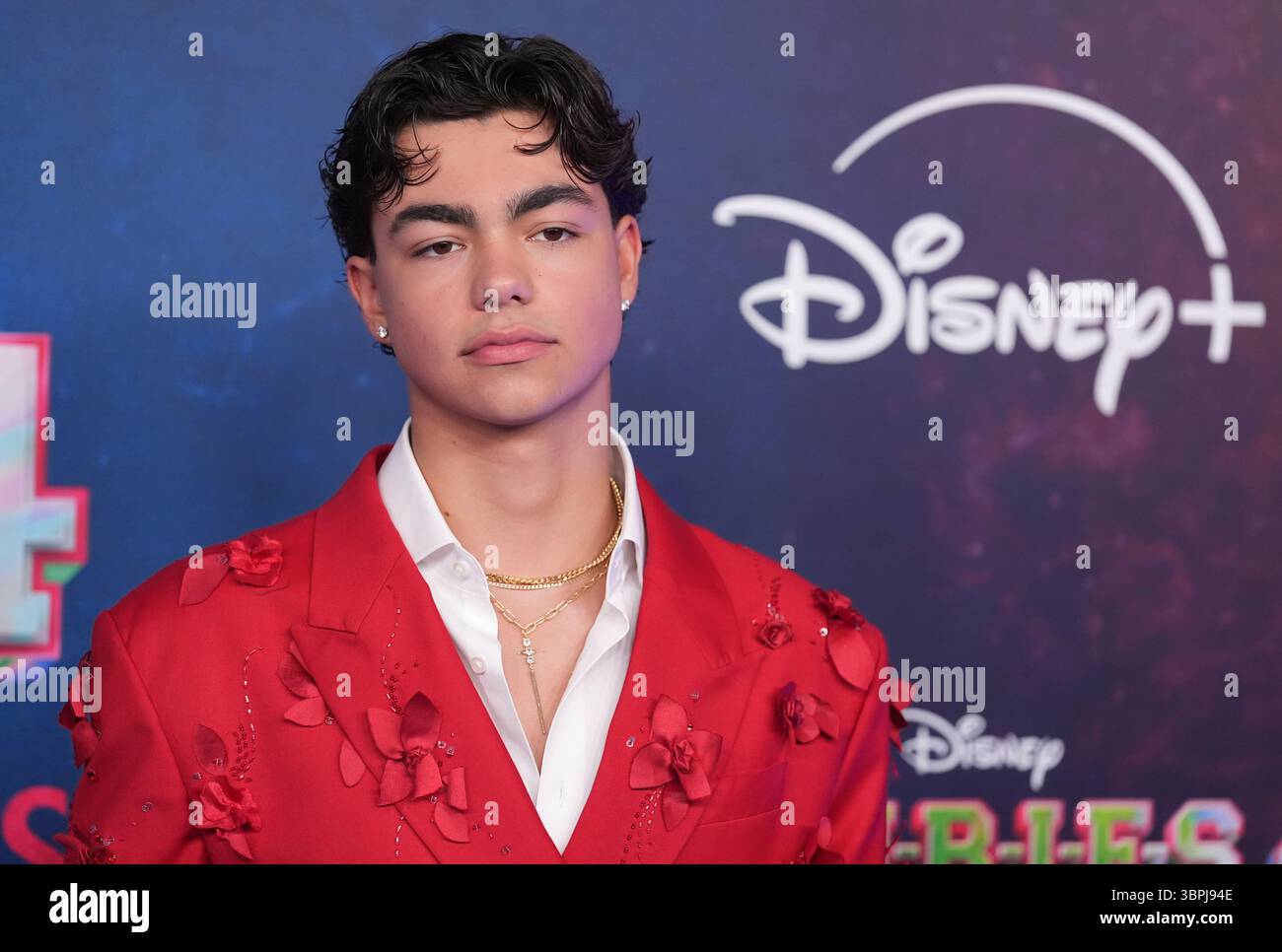 Malachi Barton poses at the premiere of "Zombies 4: Dawn of the ...